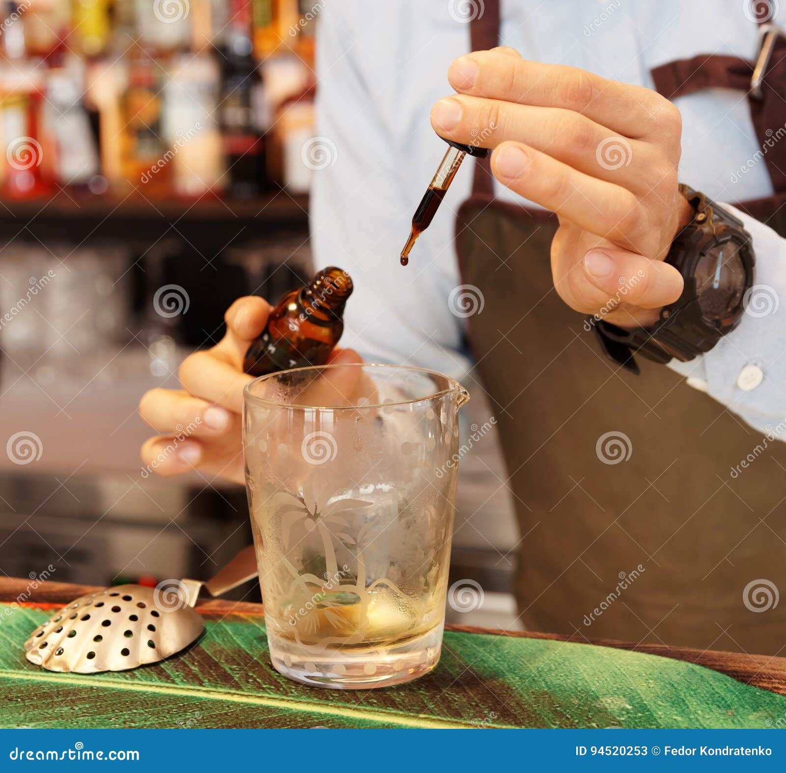 Bartender is Dropping Bitter into a Mixing Glass Stock Image - Image of ...