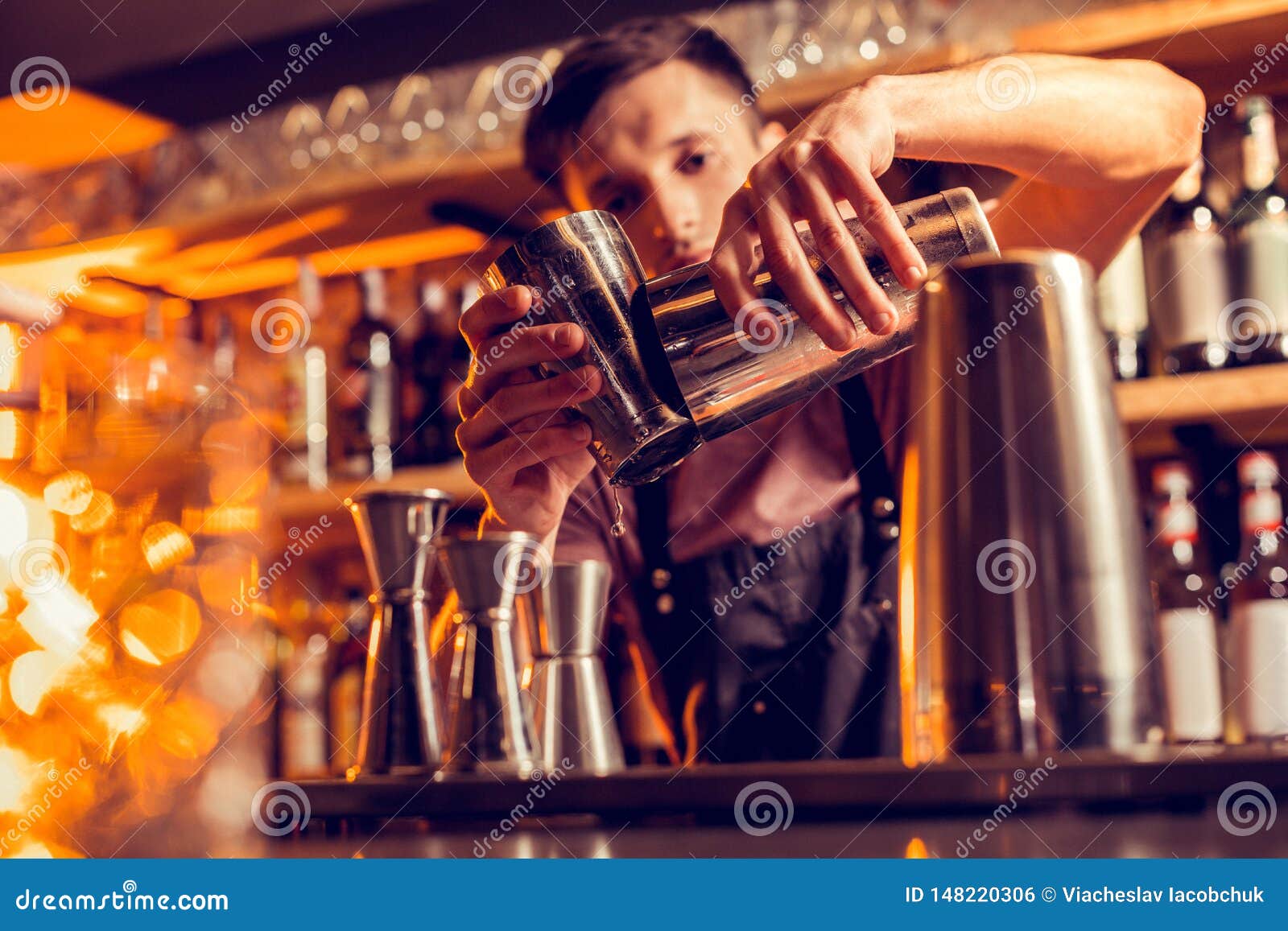 Bartender Feeling Busy while Making Cocktail for Client Stock Photo ...