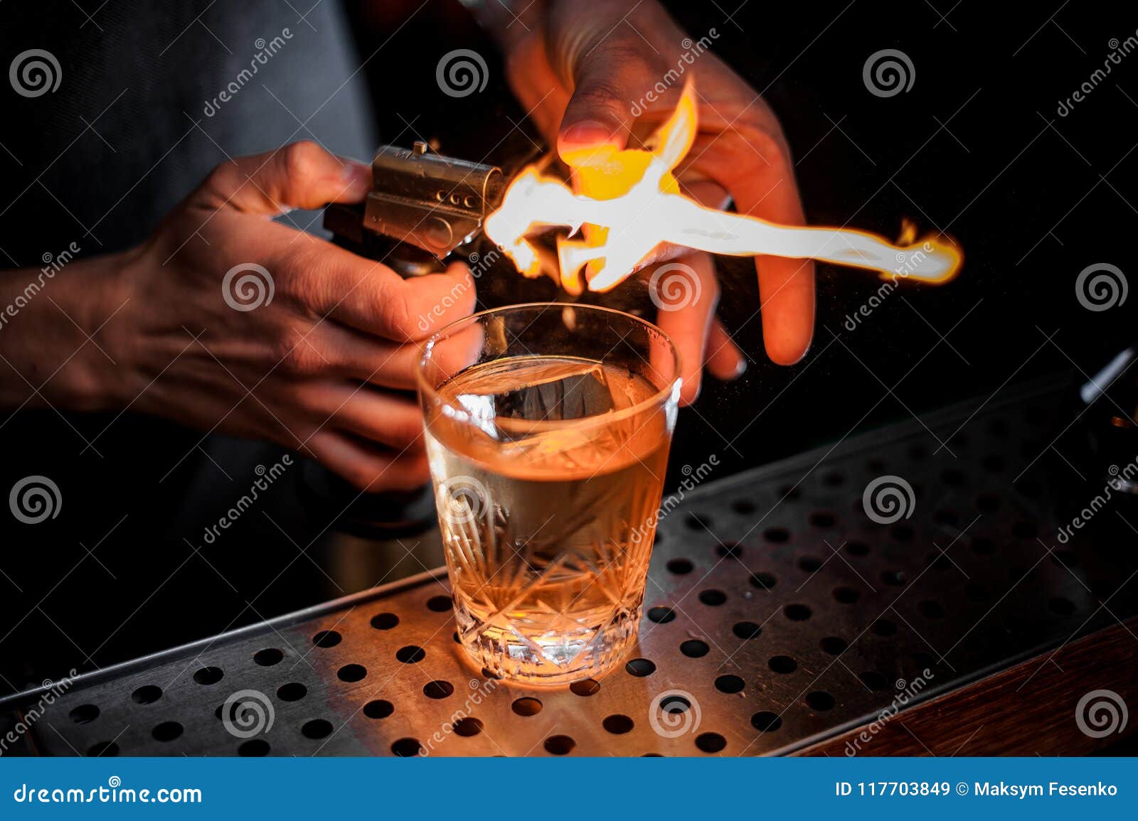 Bartender Fired the Orange Zest for Adding it To the Fresh Alcoholic ...