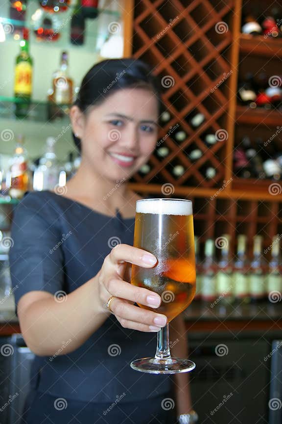Bartender giving the beer stock image. Image of pilsener - 5070777
