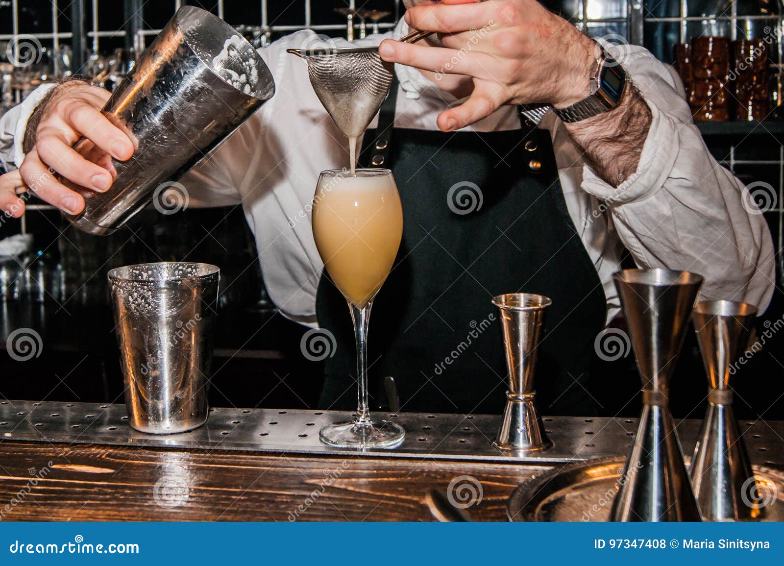 Bartender makes a cocktail stock photo. Image of pure - 97347408