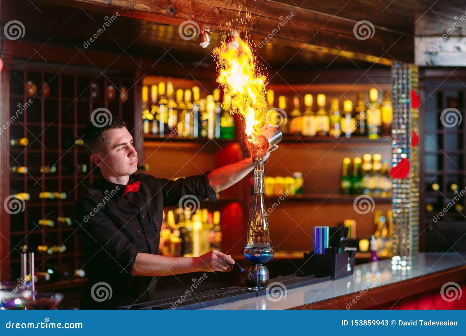 Bartender Makes Hot Cocktail in a Restaurant in the Bar. Stock Image ...