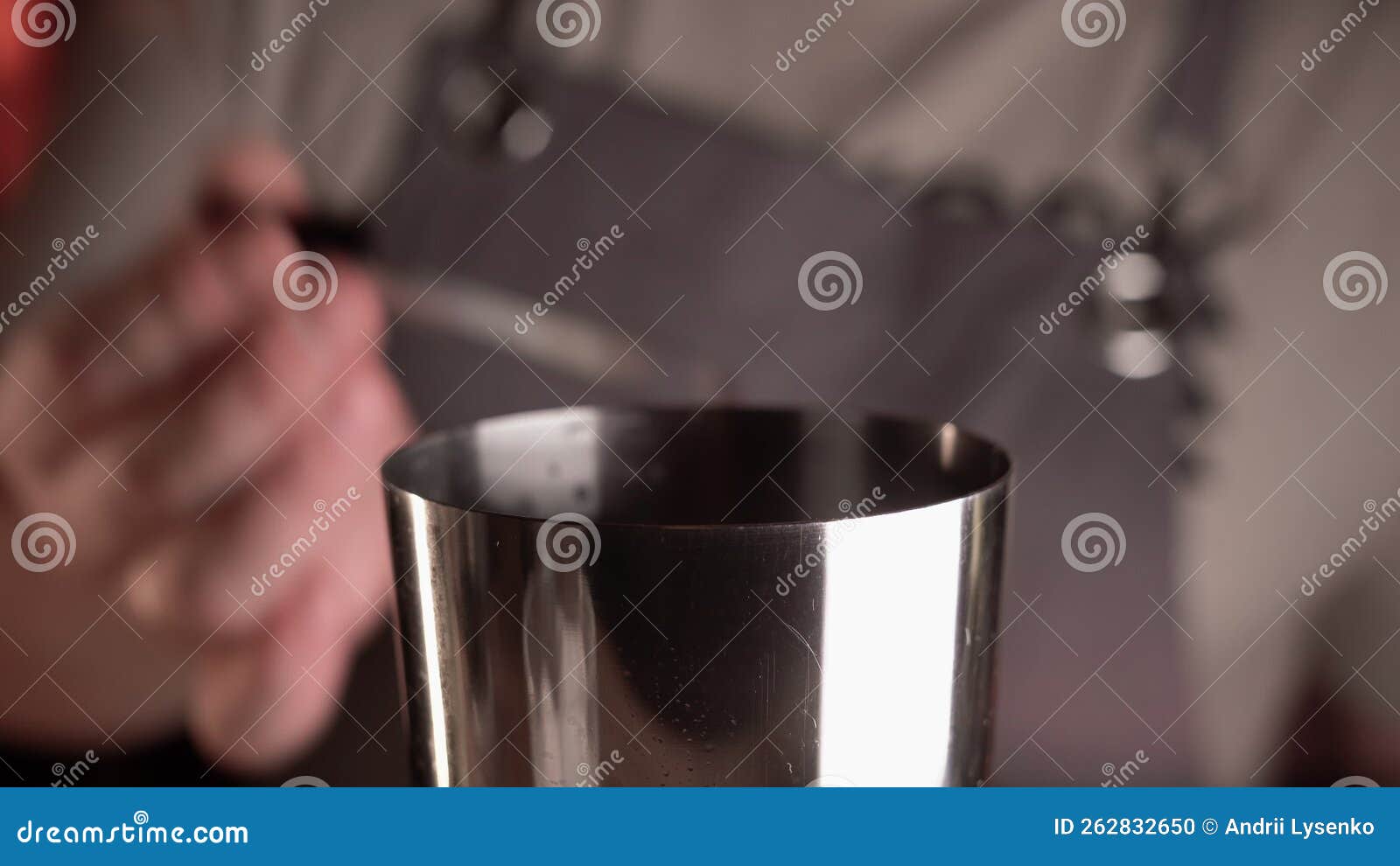 Bartender is Making a Cocktail at Bar Counter, Adding Some Bitter ...