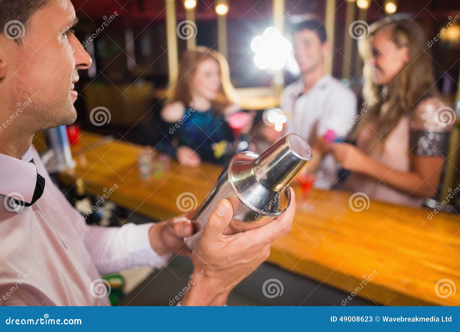 Bartender Mixing Up a Cocktail Stock Image - Image of shoulder, indoors ...