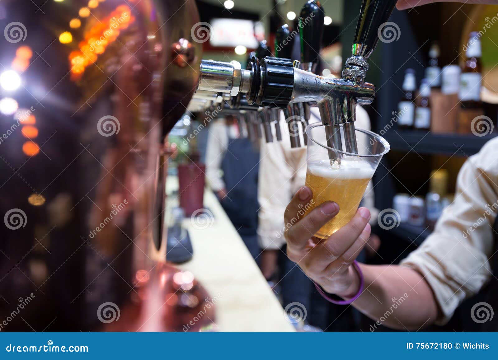 Bartender pouring beer stock photo. Image of beauty, happy - 75672180