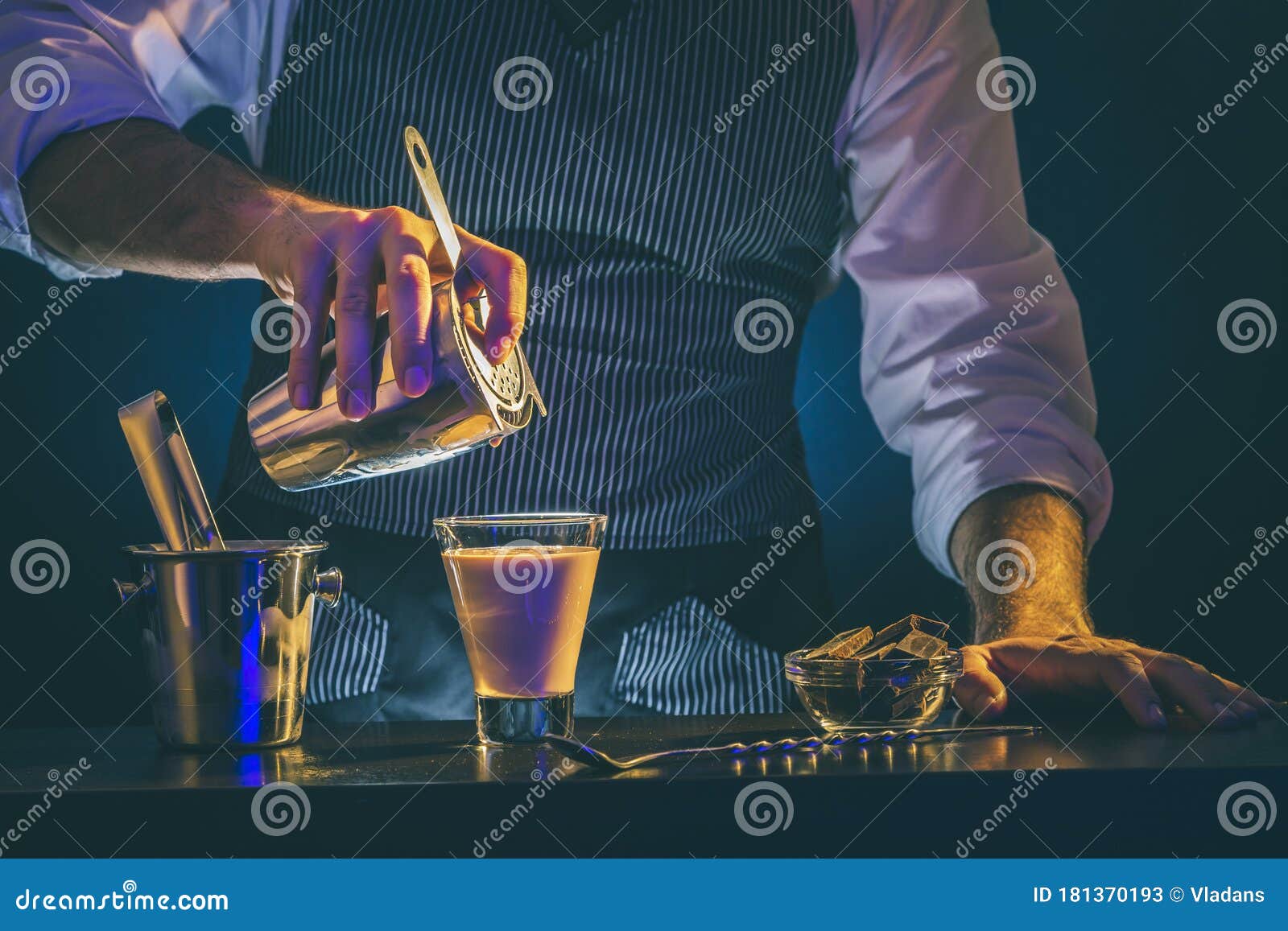 Bartender Pouring Cocktail from Shaker into Glass Stock Image - Image ...