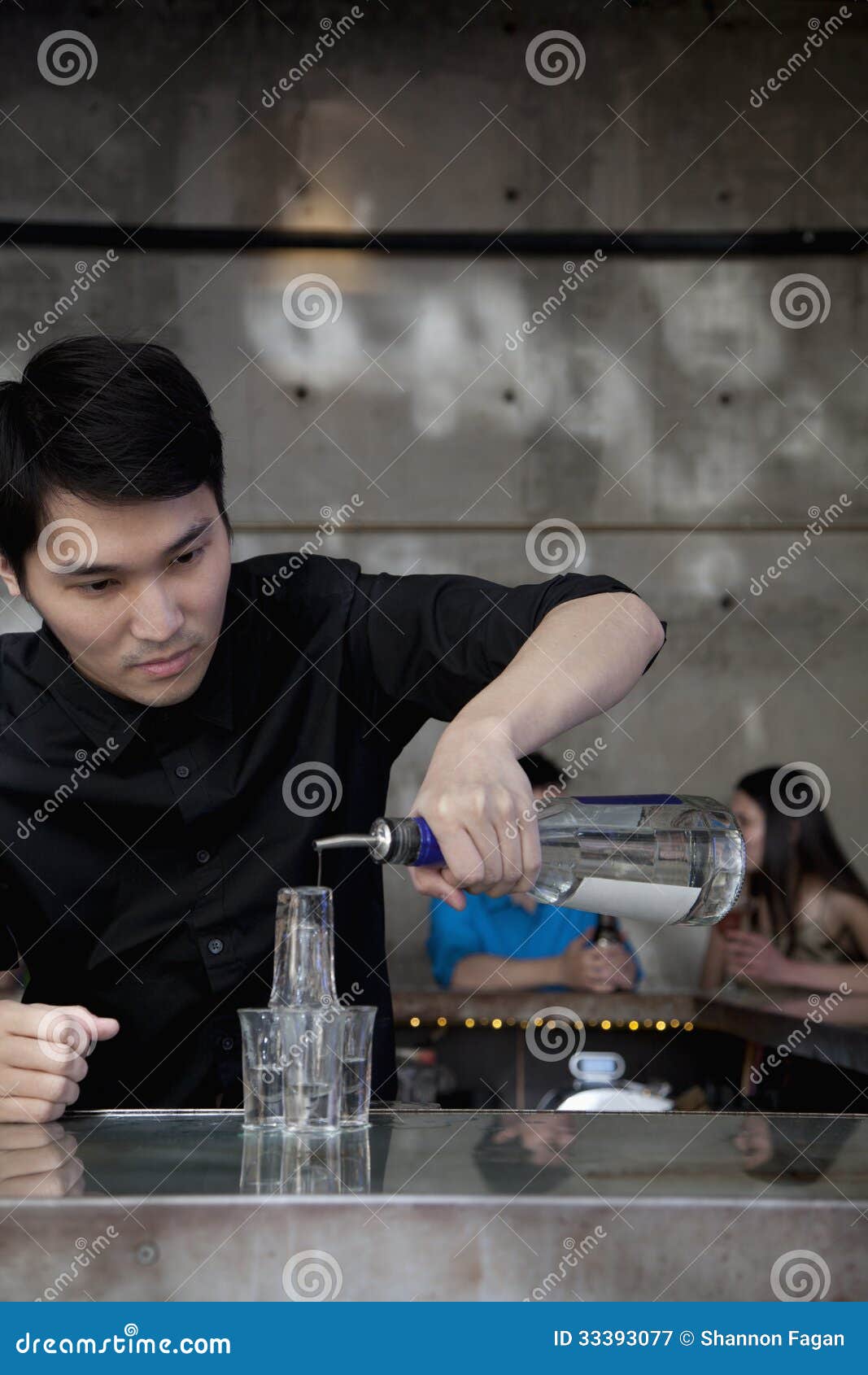 Bartender Pouring Licour on Shot Glass Pyramid Stock Image - Image of ...
