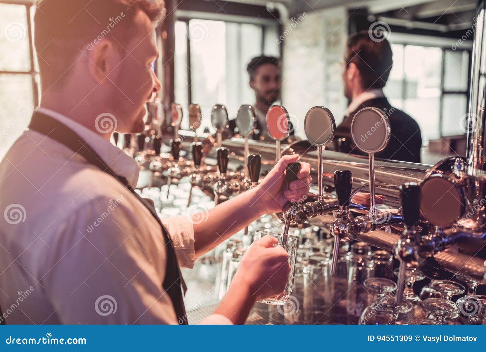Bartender in pub stock image. Image of meeting, cheerful - 94551309