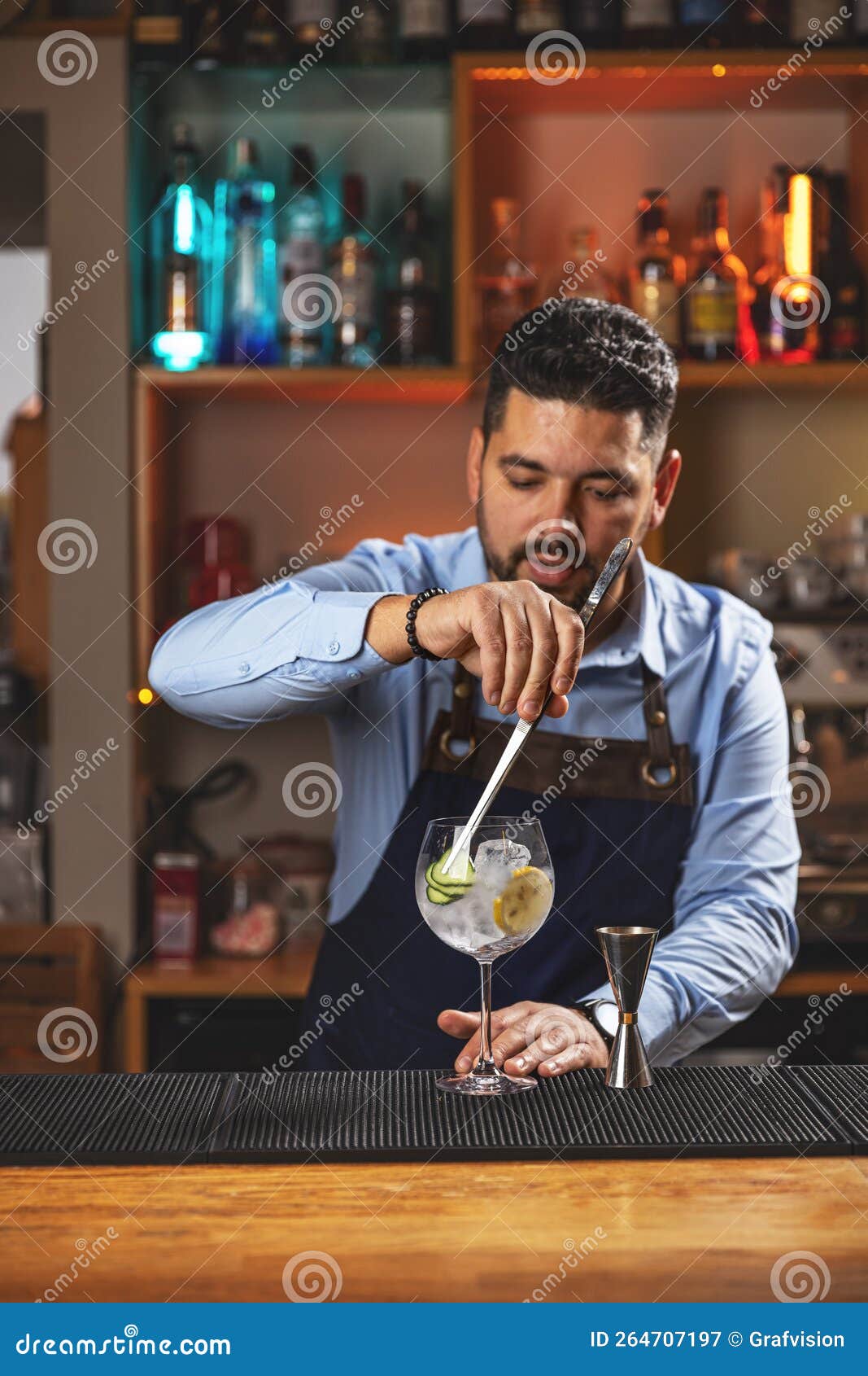 Bartender putting cucumber stock image. Image of fresh - 264707197