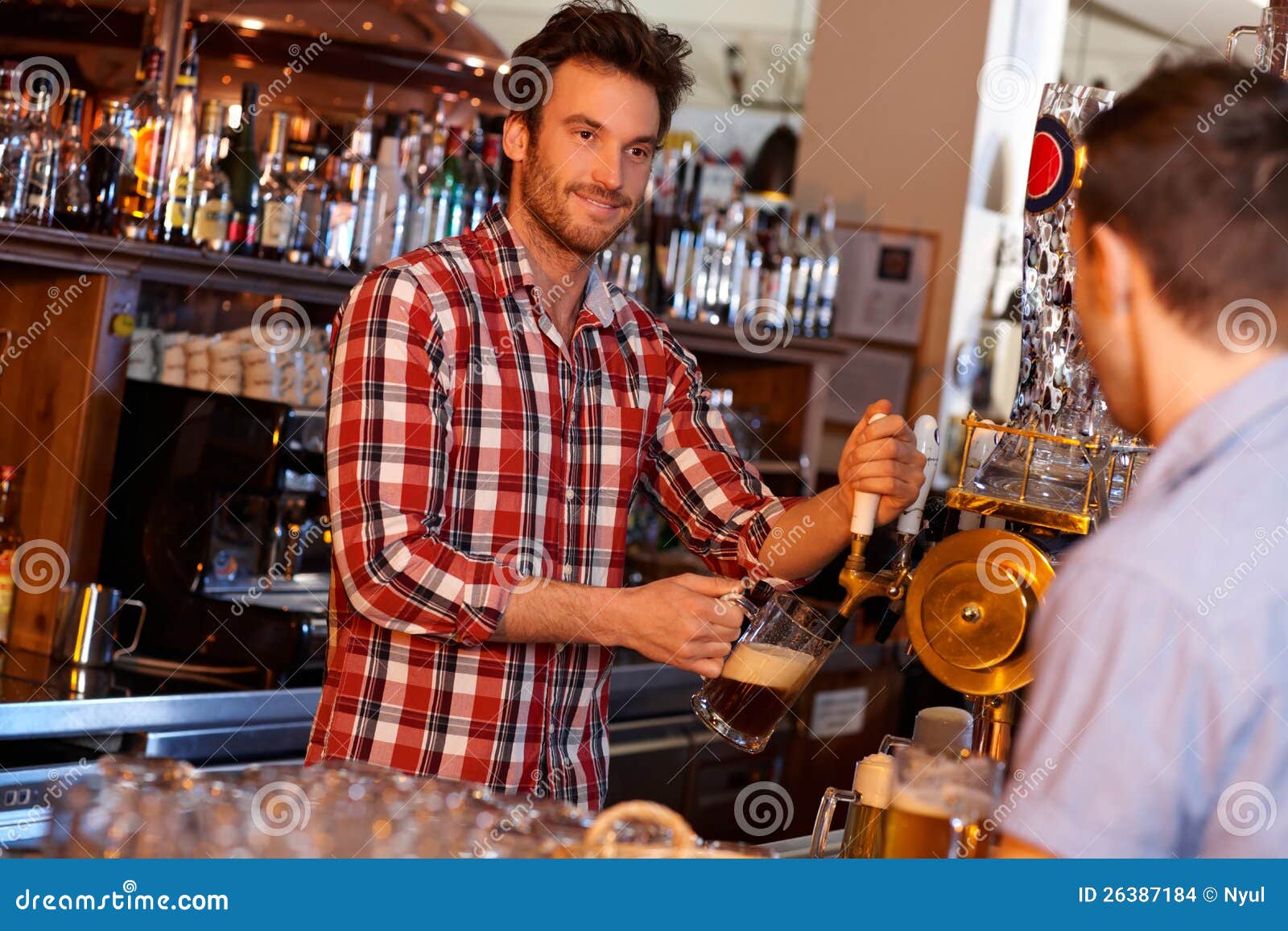 Bartender Serving Draught Beer in Bar Stock Photo - Image of caucasian ...