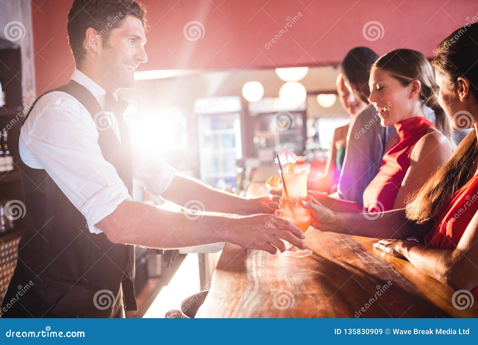 Bartender Serving Drinks To Customer Stock Image - Image of 3034 ...