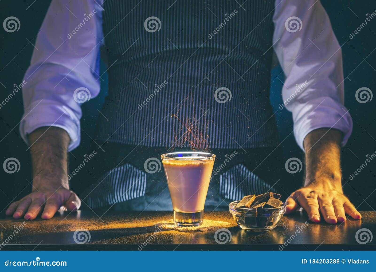 Bartender Serving Sparkling Baileys Comet Cocktail on Fire Stock Photo ...
