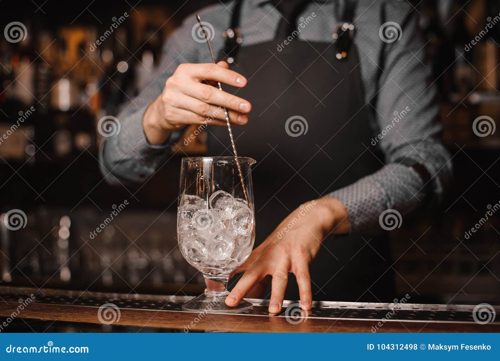 Bartender Stirring Ice Cubes with Help of Spoon Stock Photo - Image of ...