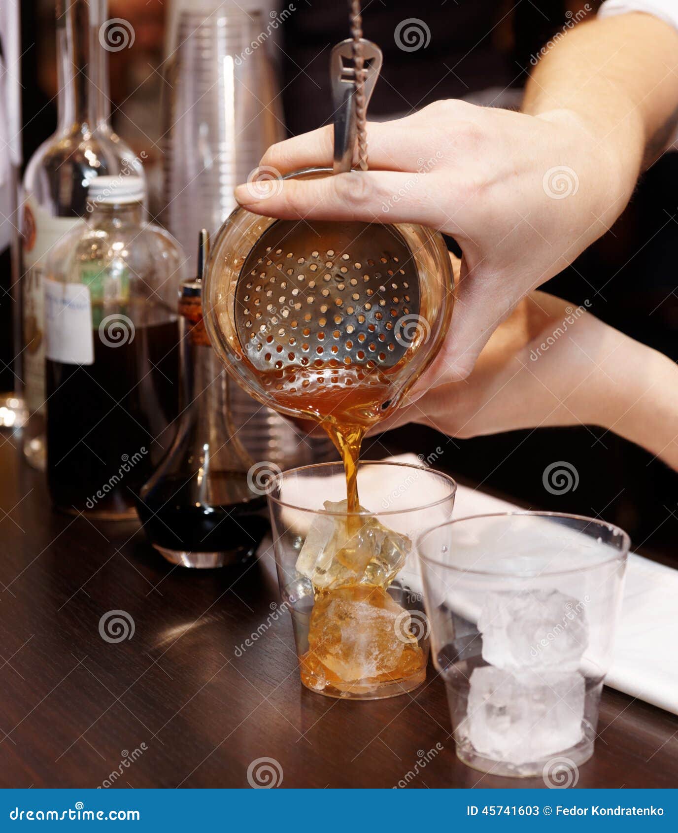 Bartender is Straining Cocktail into Glass Stock Image - Image of ...