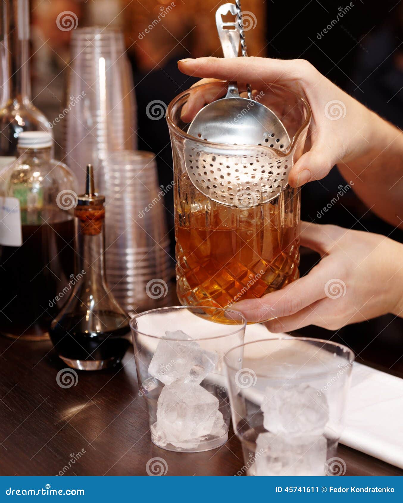 Bartender is Straining Cocktail into Glass Stock Image - Image of ...