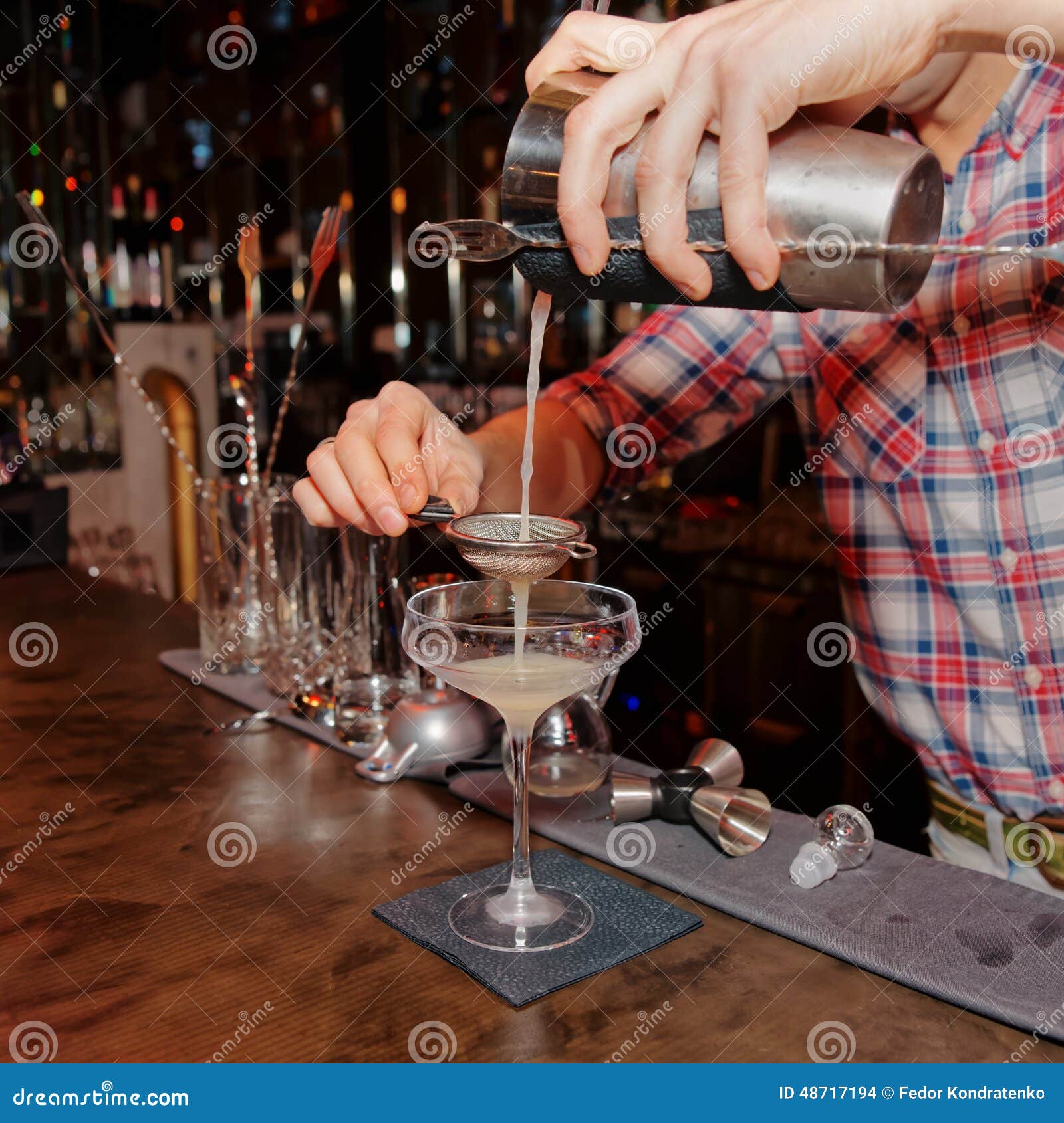 Bartender is Straining Drink in Glass Stock Photo - Image of drink ...