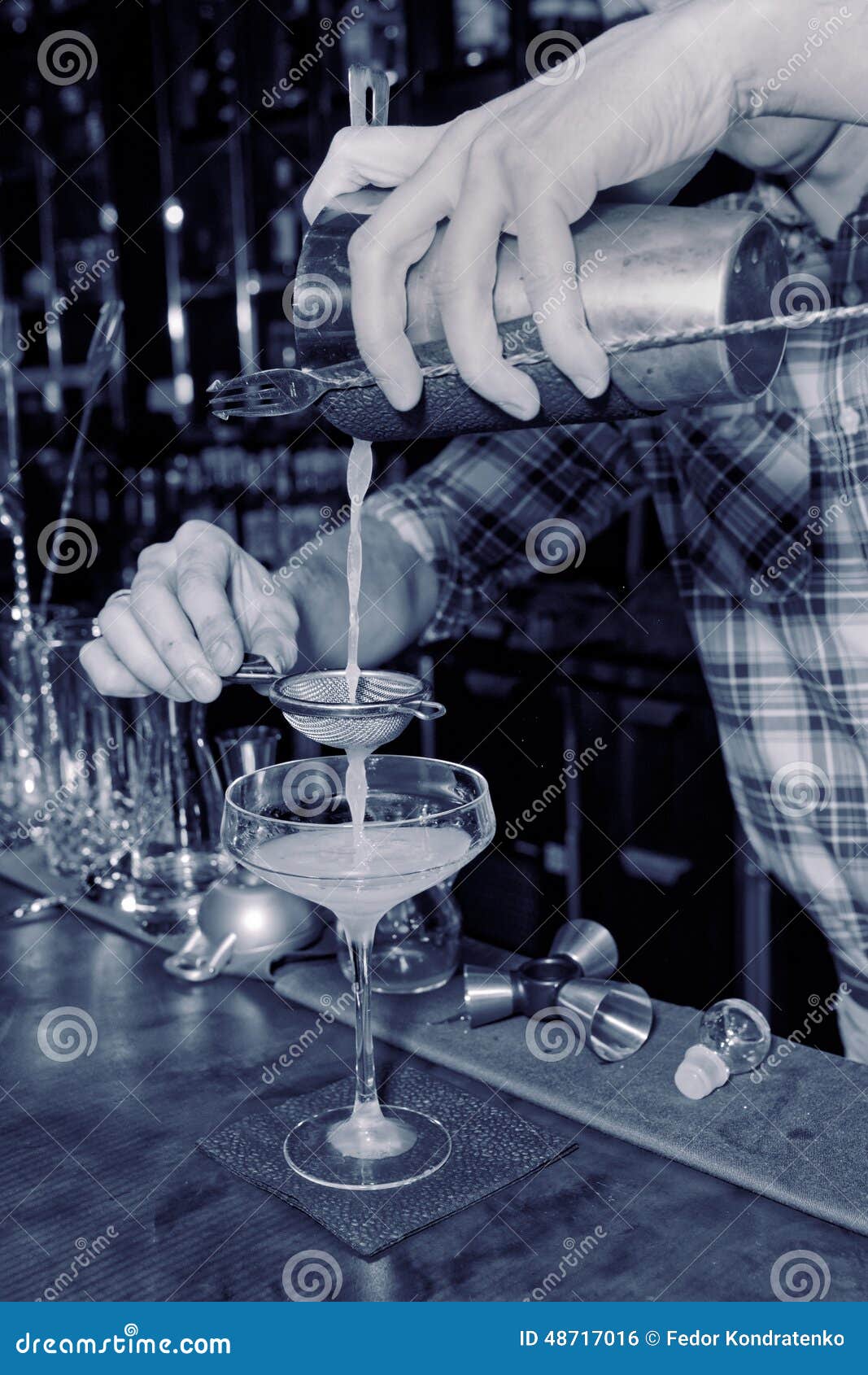 Bartender is Straining Drink in a Glass Stock Photo - Image of club ...