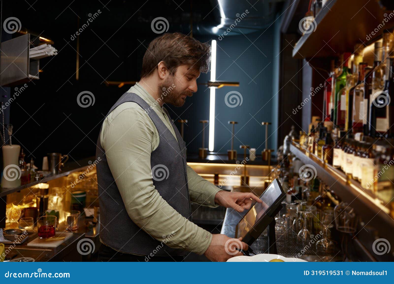 Bartender Using Digital Panel To for Processing Bar Visitors Orders ...