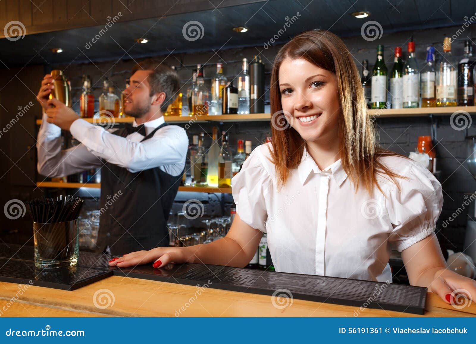 Bartender and a Waitress during Work Stock Image - Image of clear ...