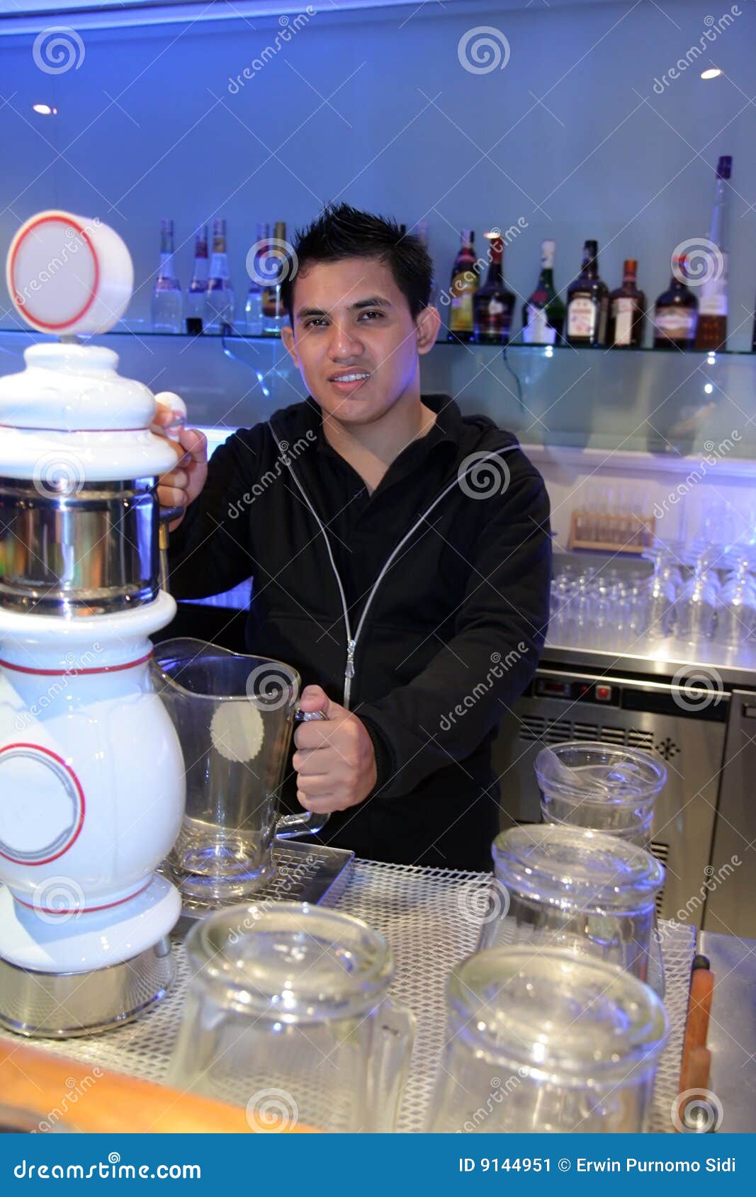 Bartender at work stock image. Image of person, hotel - 9144951