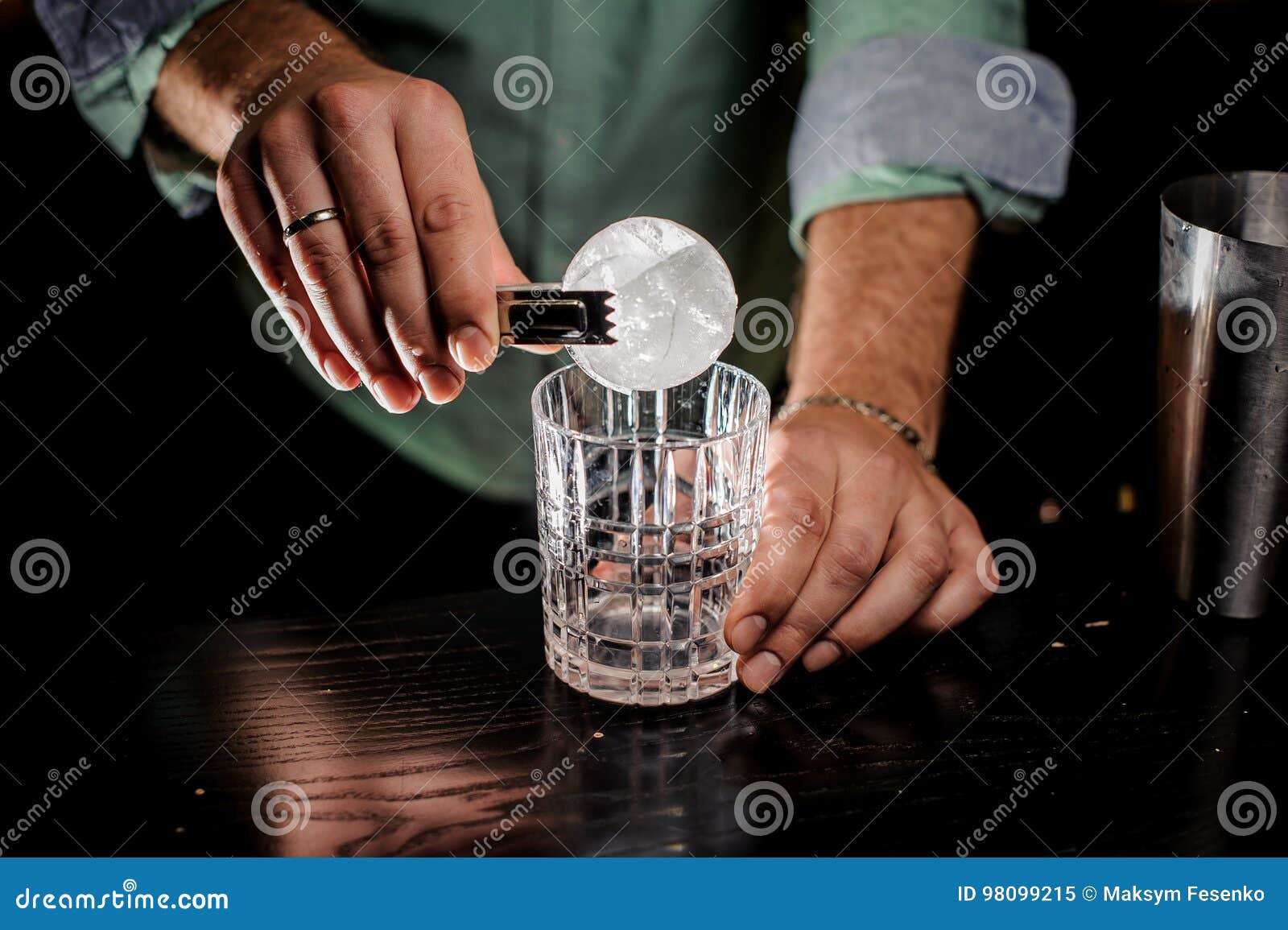 Bartending Concept Hand Cut Ice Ball at Bar Stock Image - Image of cube ...