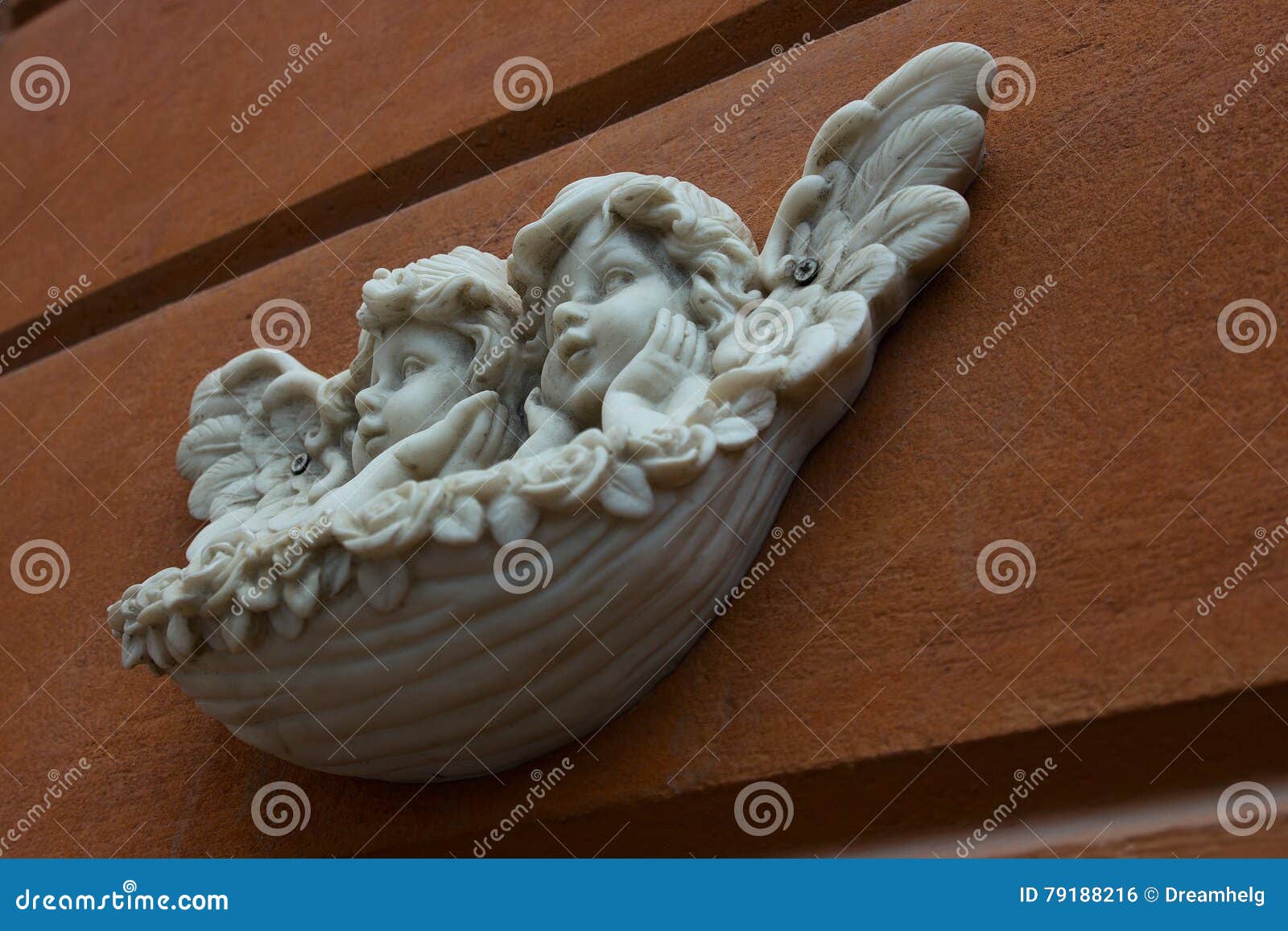 Bas-relief Couple of Angels on Wall Stock Photo - Image of vegetation ...