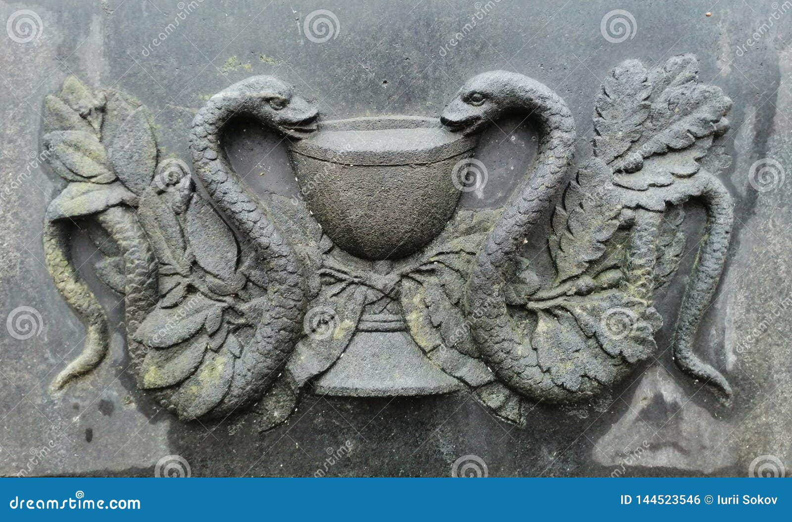 Bas-relief in the Form of Two Snakes and a Bowl on the Surface Stock ...