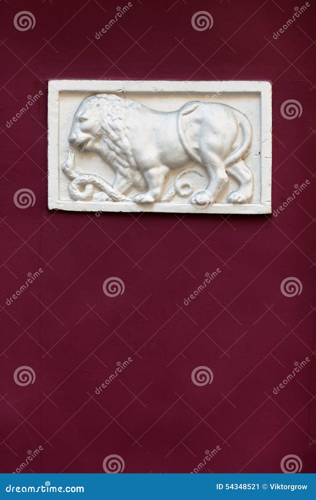 The Bas-relief of a Lion and a Snake on the Facade Stock Image - Image ...