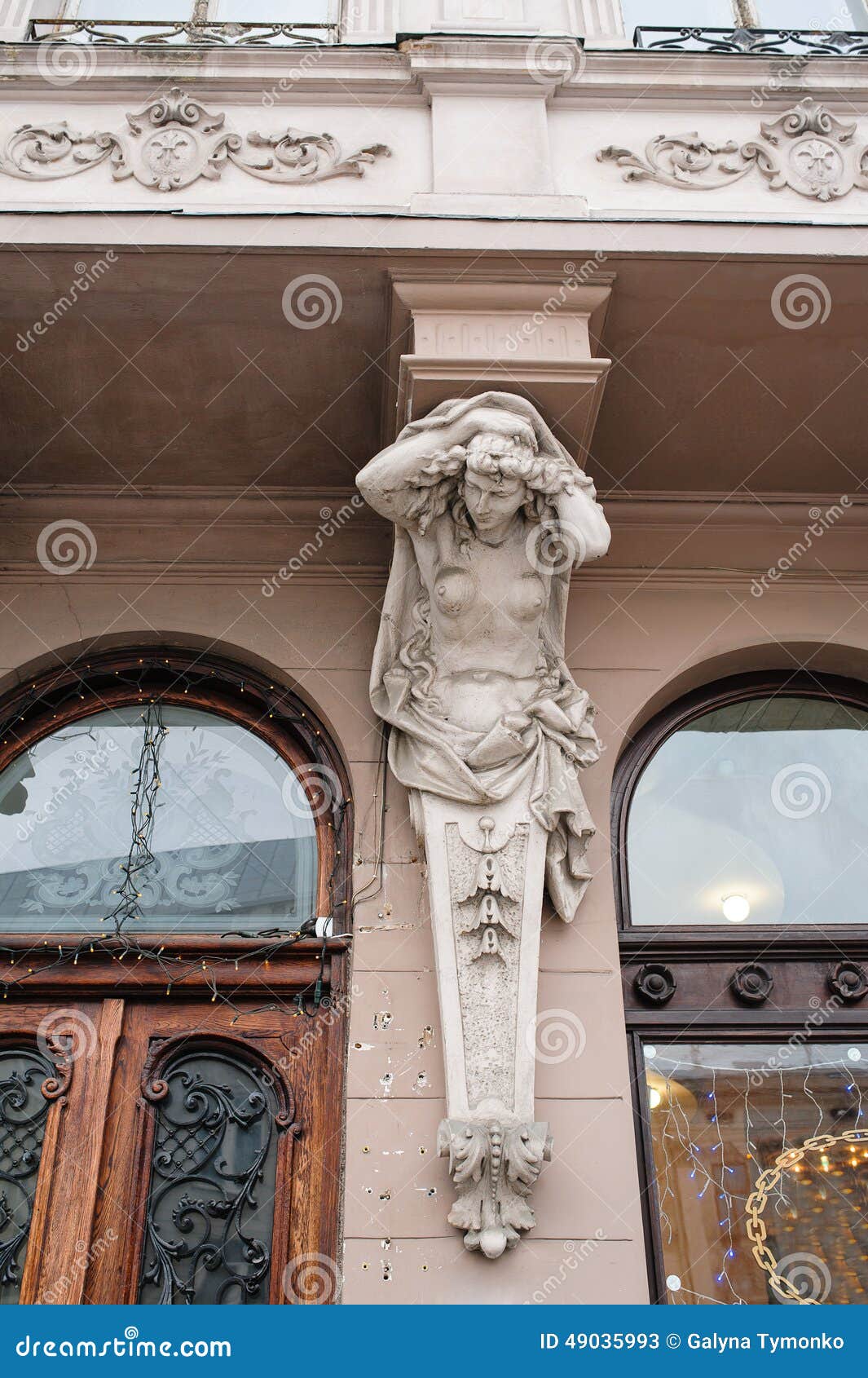 Bas-relief of a Woman Holding a Balcony Stock Image - Image of girl ...