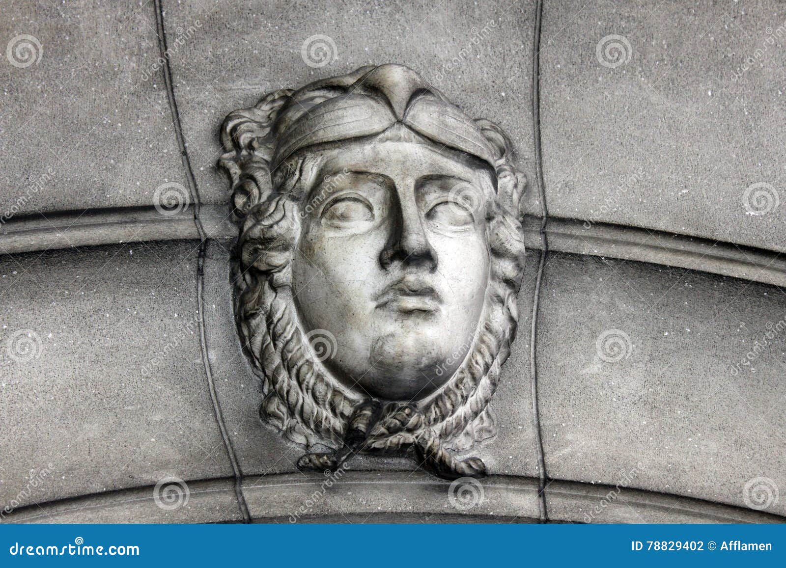Bas relief: women face stock photo. Image of montevideo - 78829402