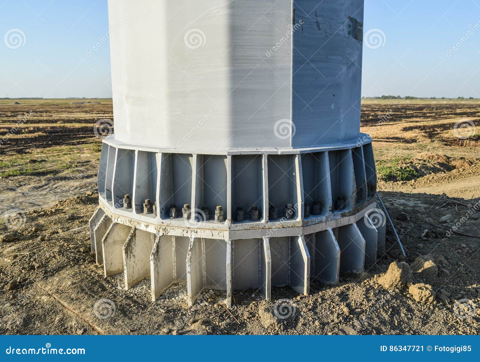 The Base of the Column Power Line Support. Massive Metal Pole Stock ...