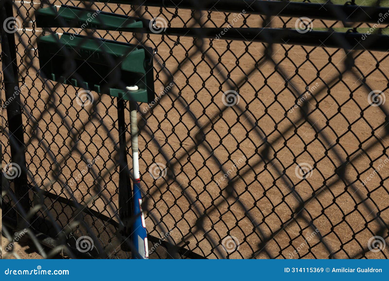 Baseball Bat in Front of Grids on the Playground Stock Image - Image of ...