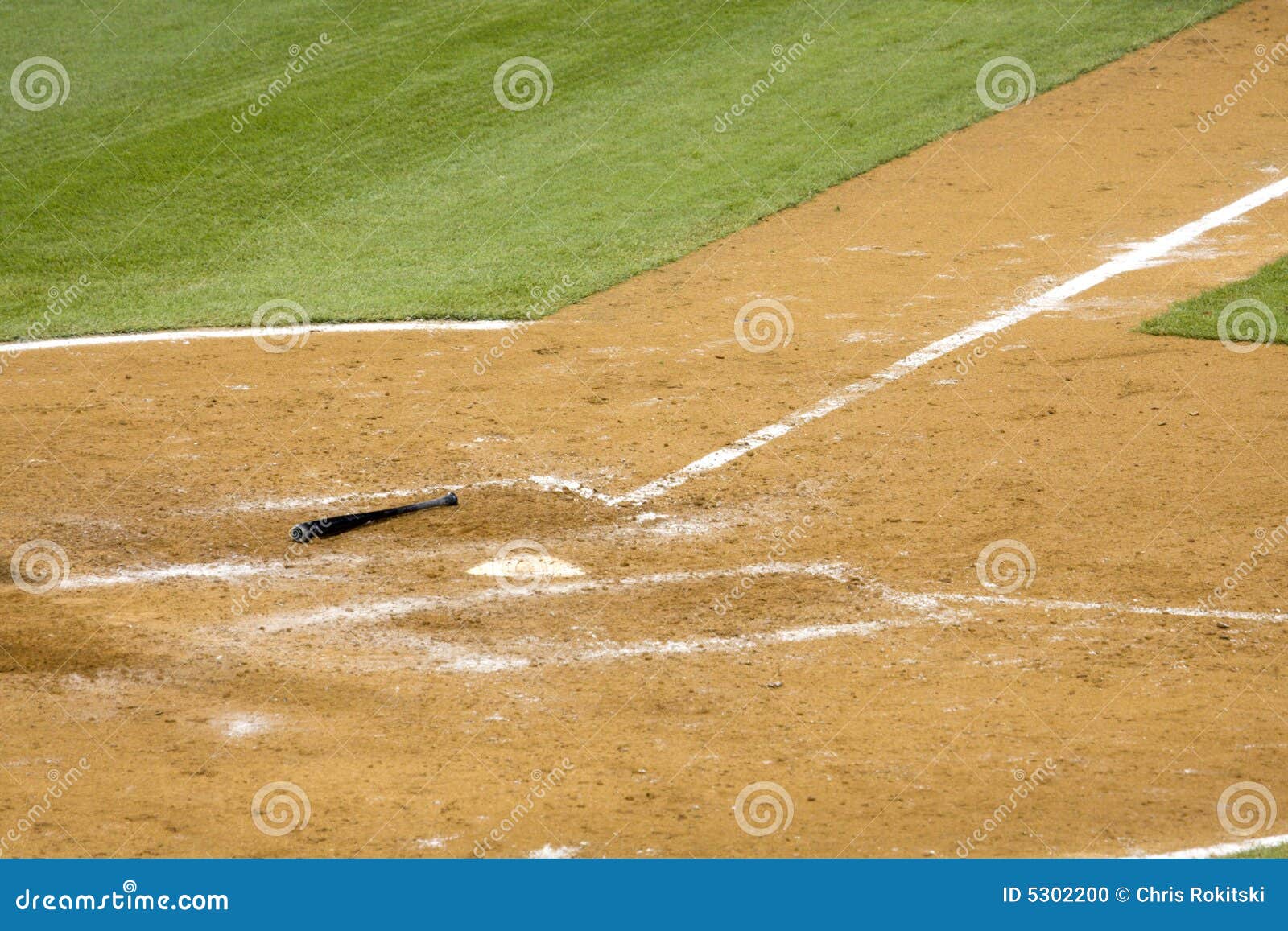Baseball bat on ground stock photo. Image of ground, batter - 5302200
