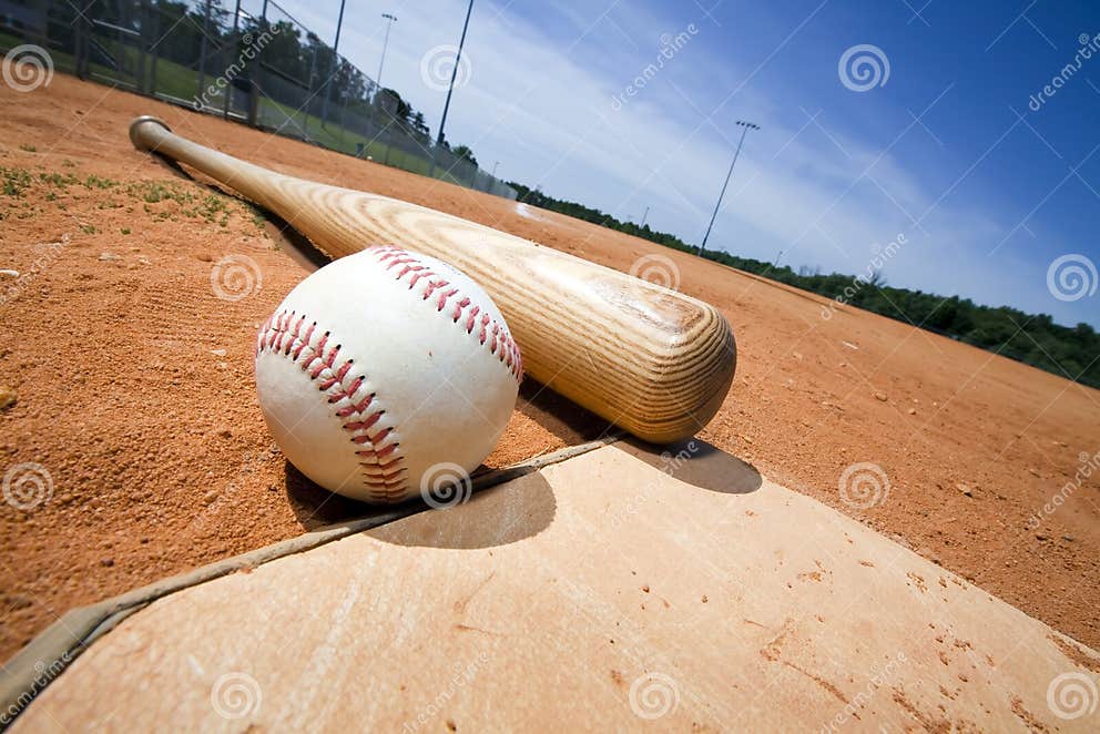 Baseball and Bat on Home Plate Stock Image - Image of pasttime, active ...