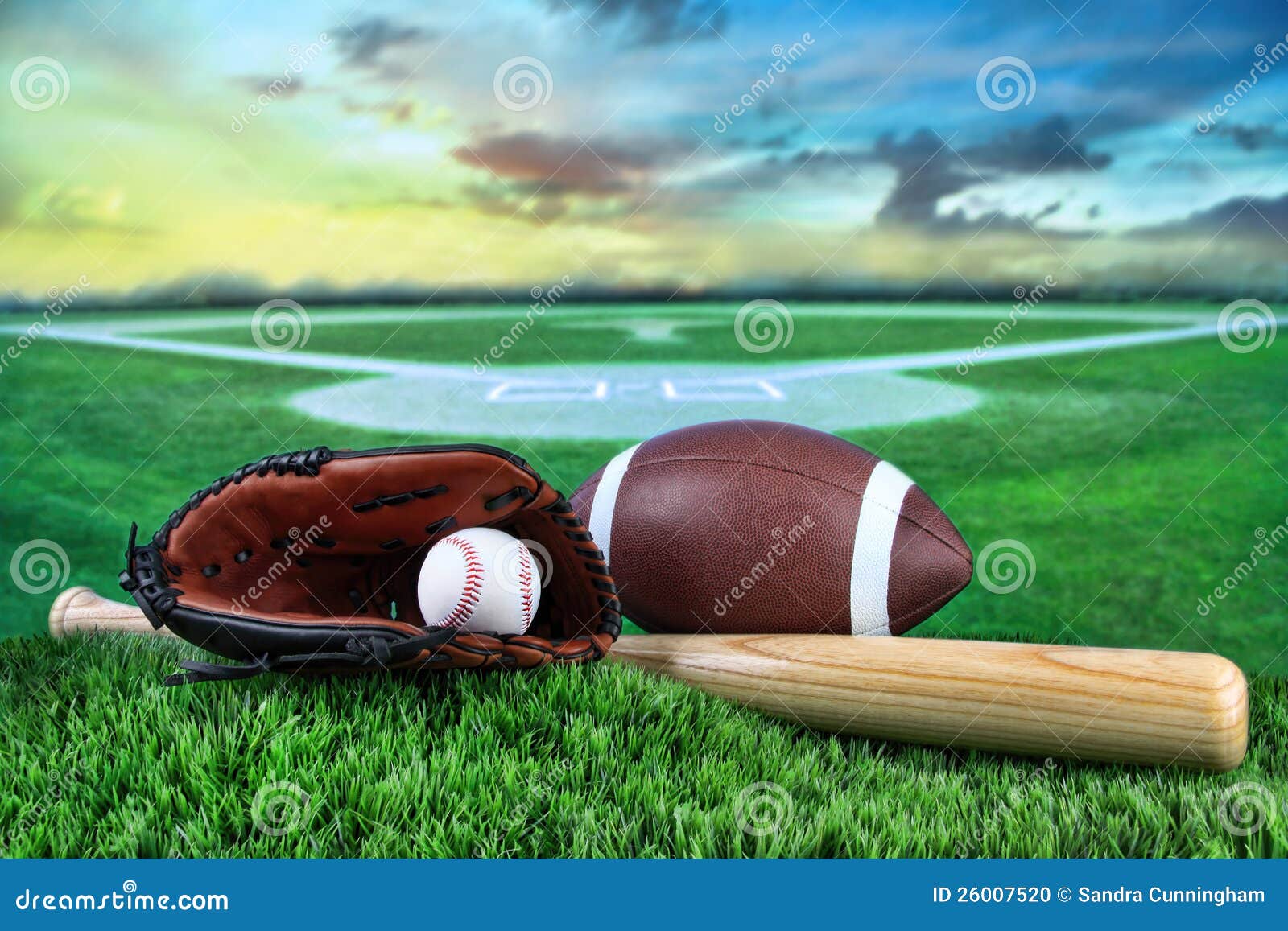 Baseball, Bat, and Mitt in Field at Sunset Stock Photo - Image of ...