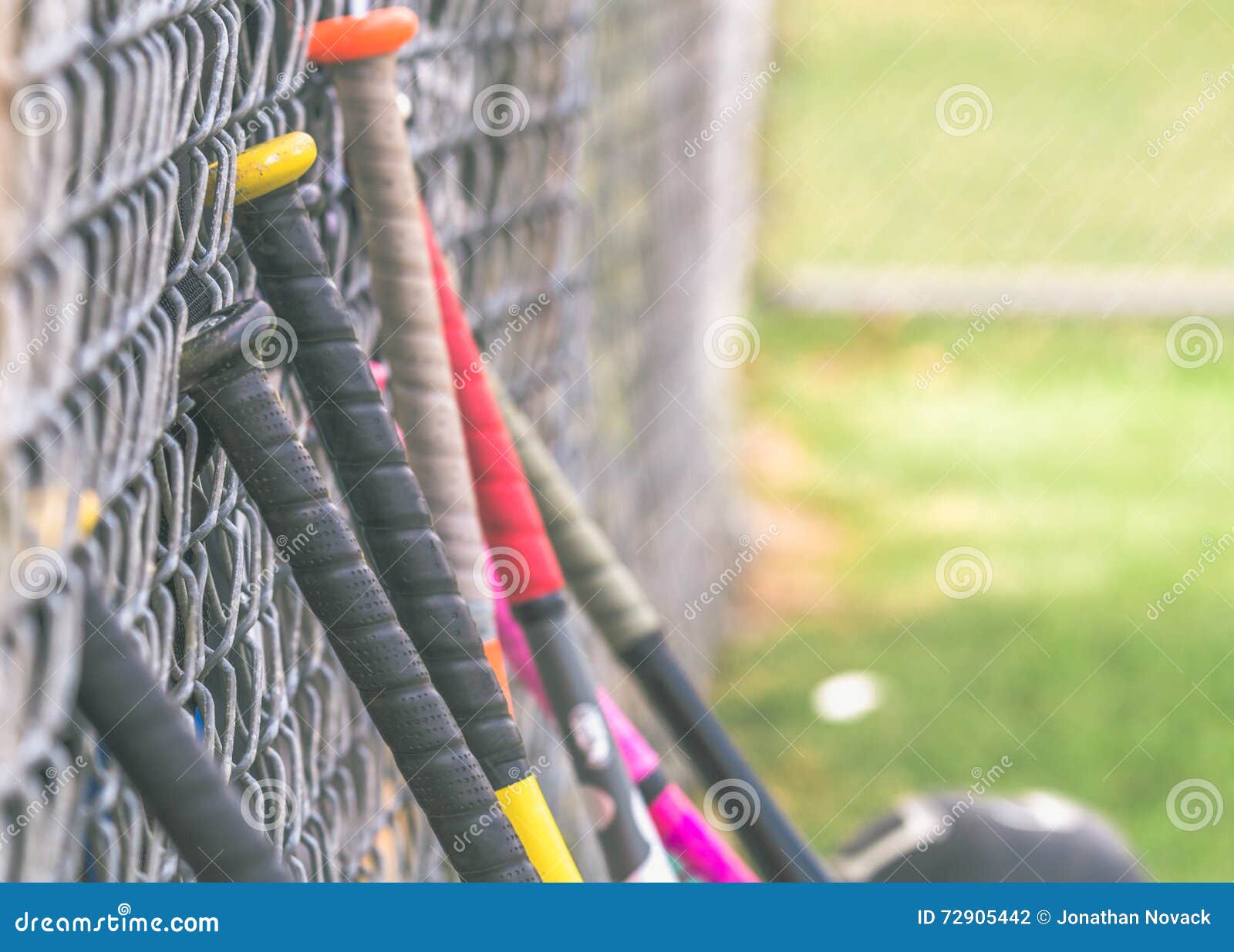 Baseball Bats Against Fence Stock Photo - Image of competition, sport ...