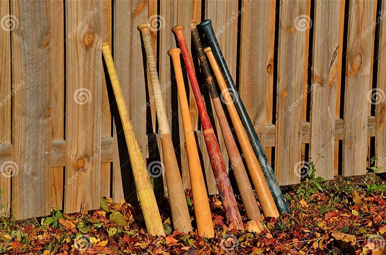 Baseball Bats Leaning on a Fence Stock Image - Image of game, fence ...