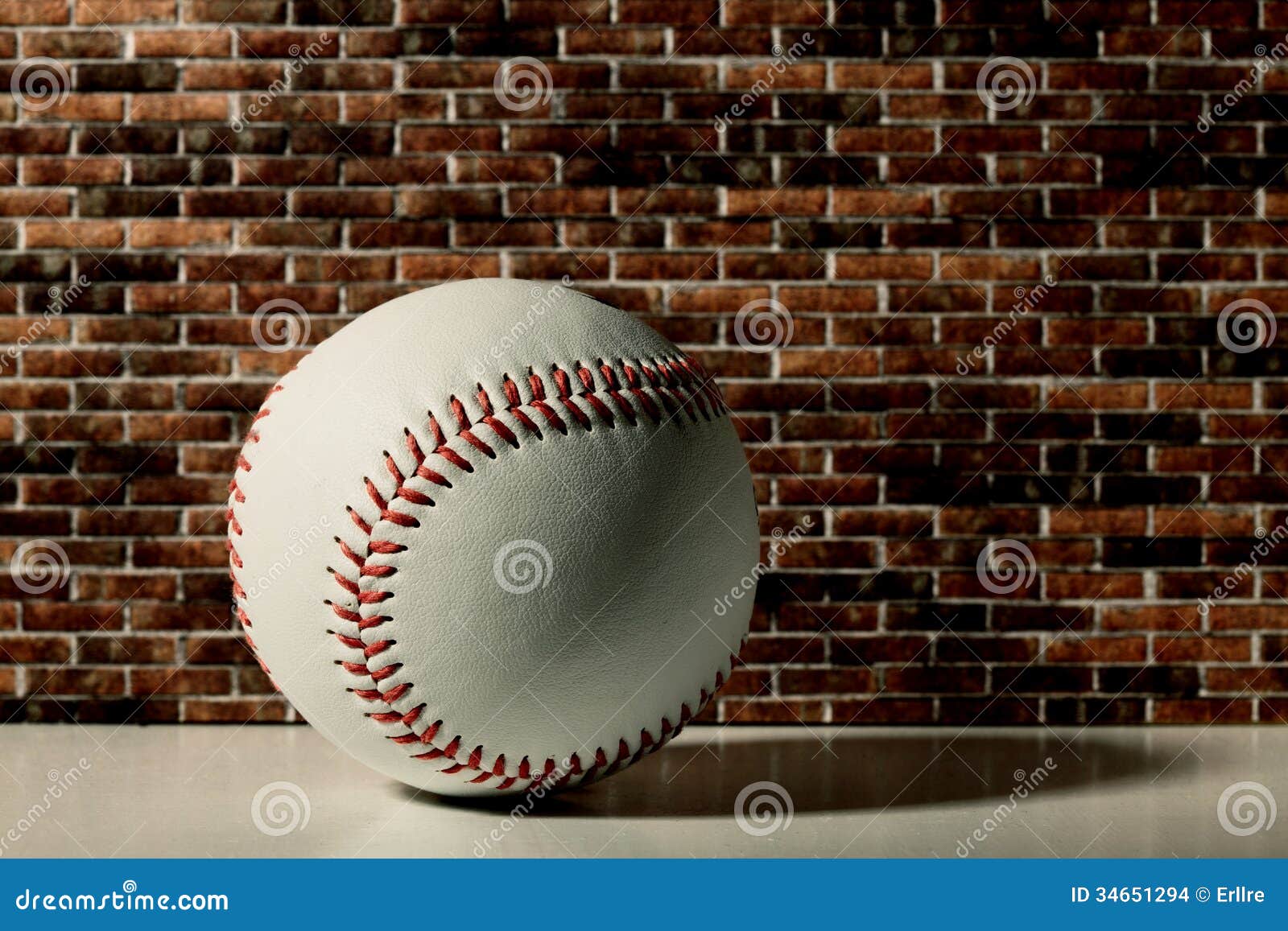 Baseball on a brick wall stock photo. Image of equipment - 34651294