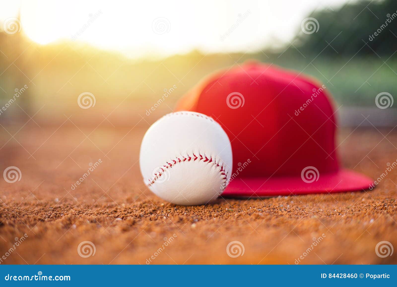 Baseball Cap and Ball on Field Stock Photo - Image of baseball ...