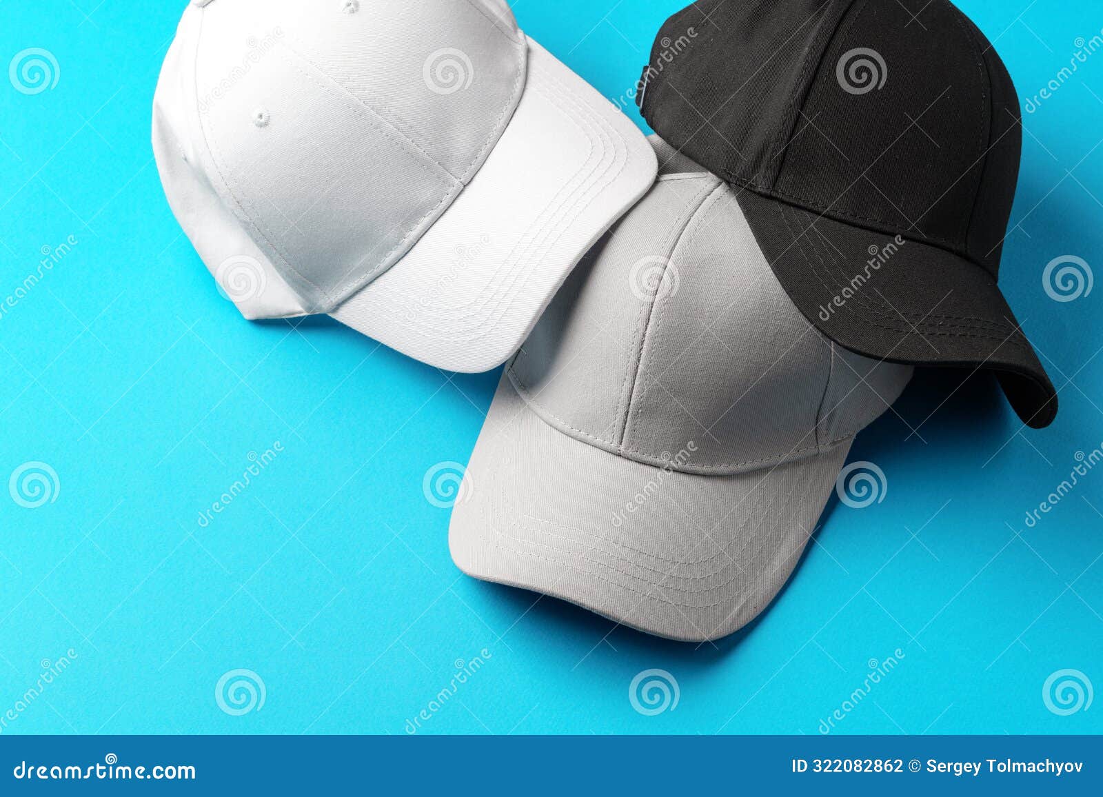 Baseball Caps on Blue Background Studio Shot Stock Photo - Image of ...