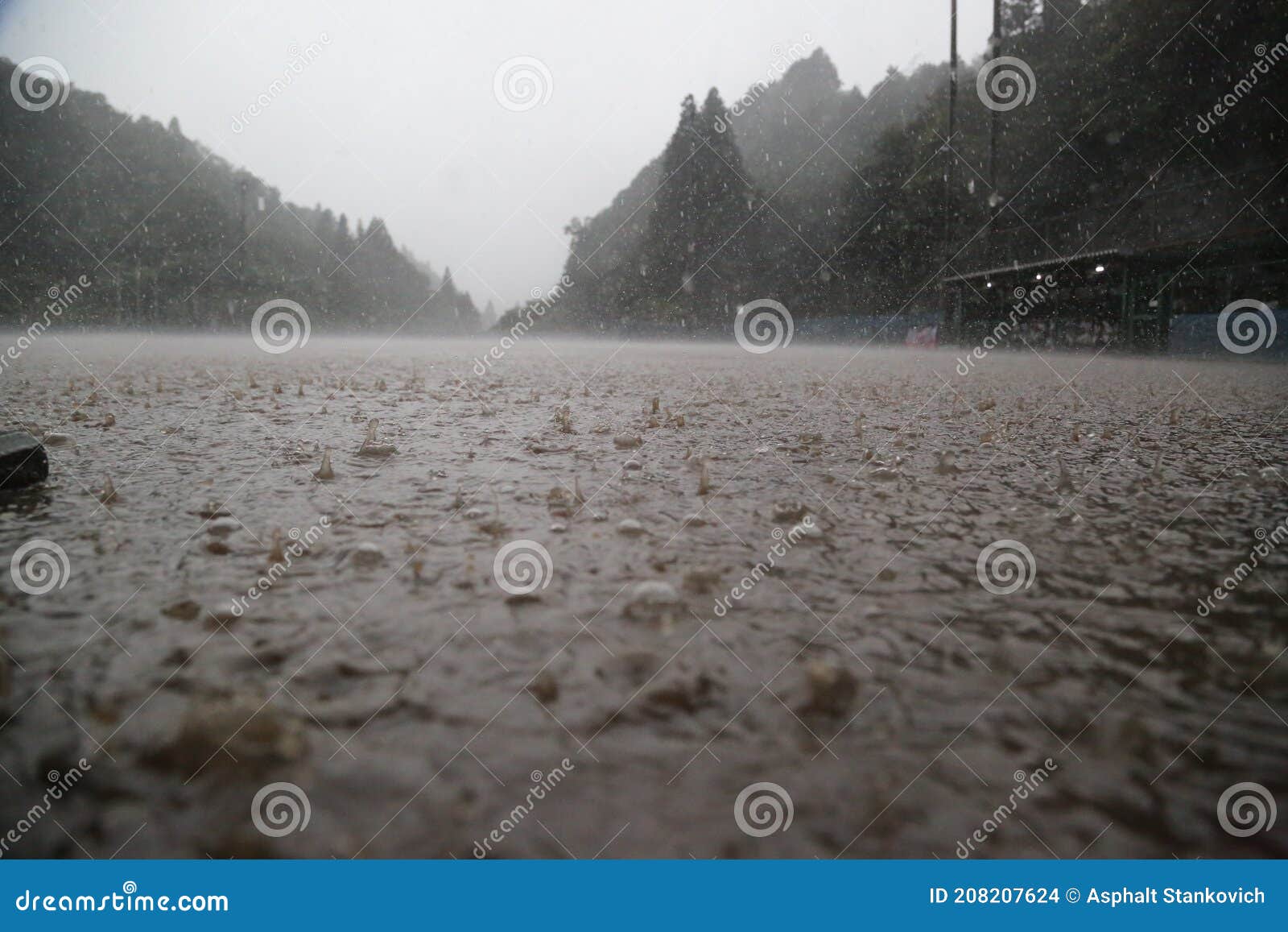 Baseball field in the rain stock photo. Image of linear - 208207624