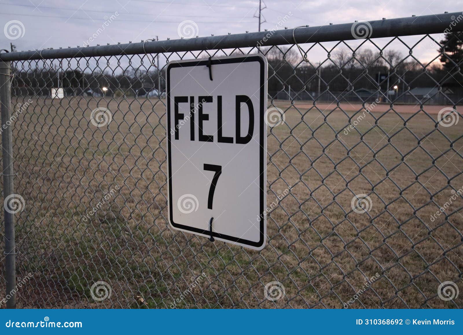 Baseball Field Sign on a Chain Link Fence Stock Photo - Image of white ...