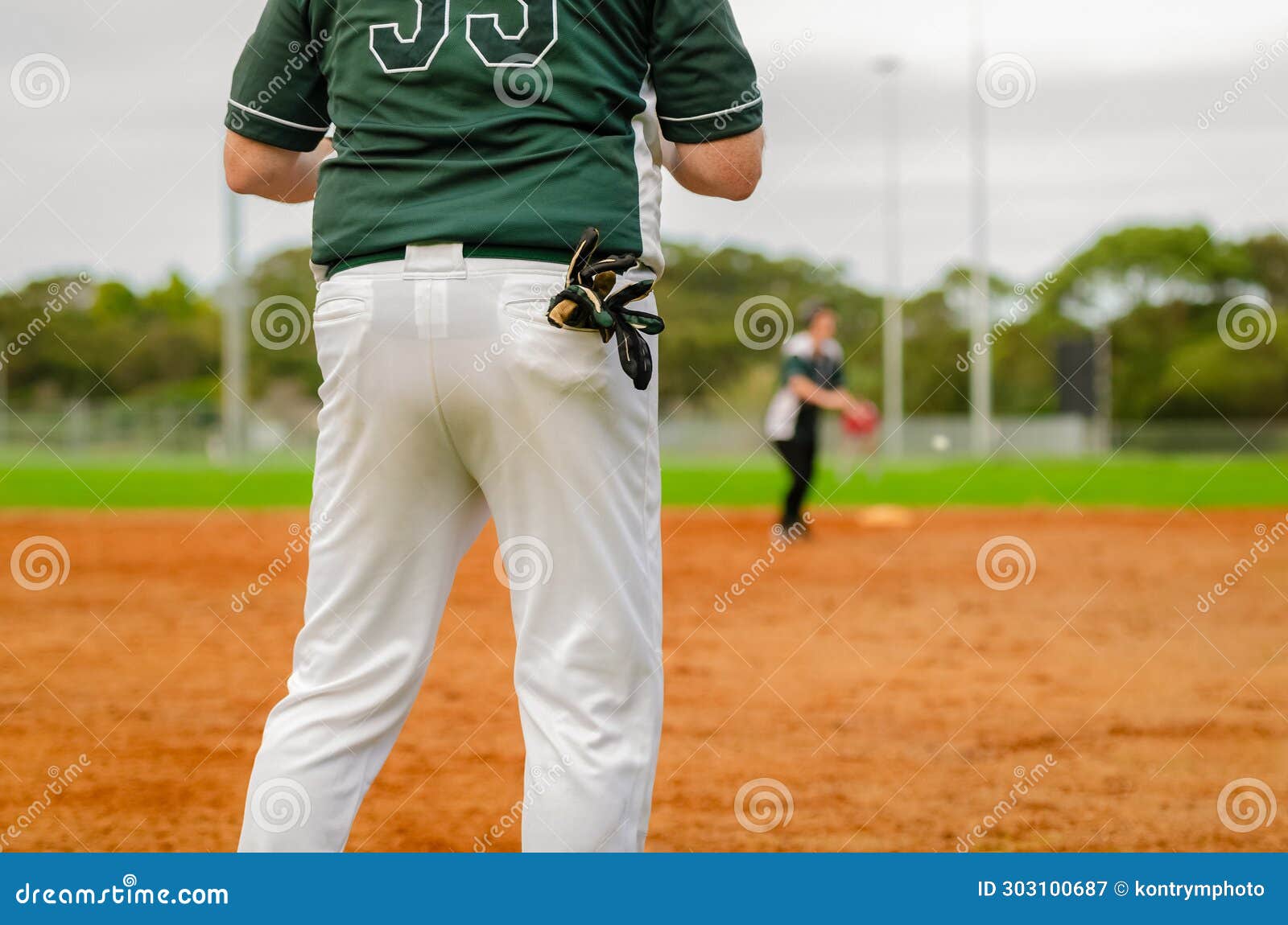 Baseball Game, Runner on the Third Base is Watching the Play and ...