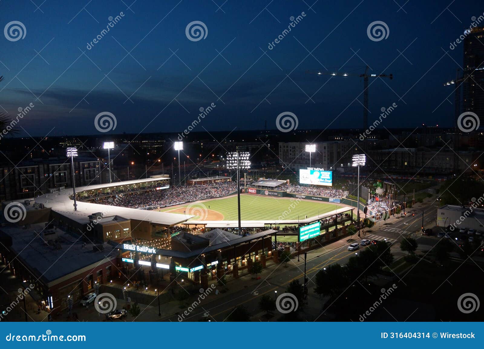 A Baseball Game in the Stadium at Night Time with Spectators Editorial ...