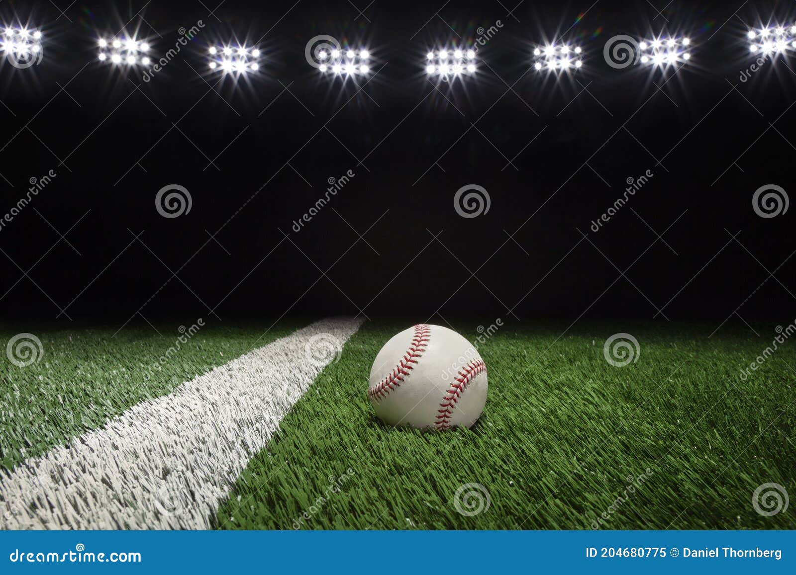 Baseball on a Field with Stripe and Black Background Under Lights Stock ...