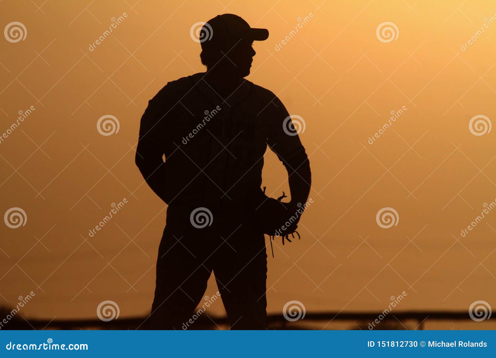 Baseball pitcher at sunset editorial image. Image of small - 151812730