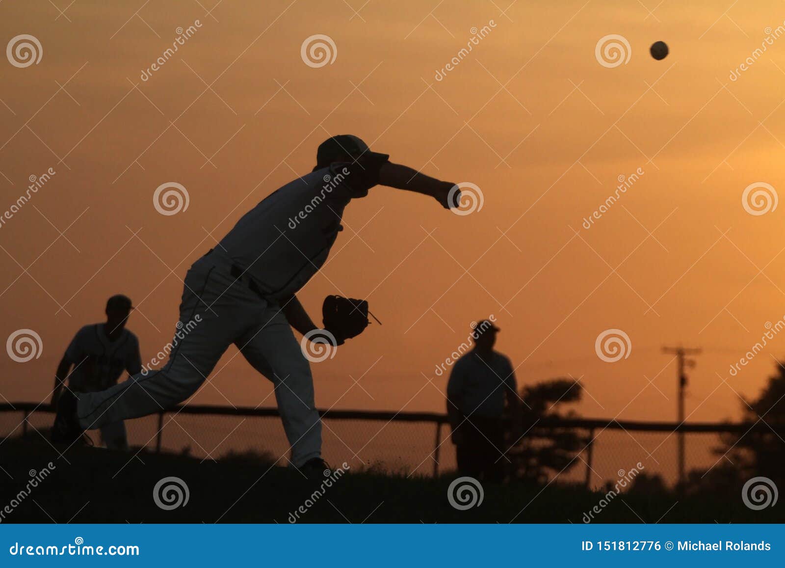 Baseball pitcher at sunset editorial photo. Image of americana - 151812776