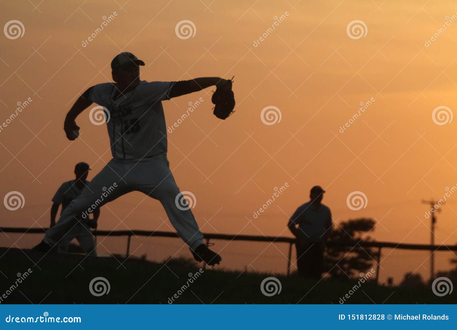 Baseball pitcher at sunset editorial stock photo. Image of throwing ...