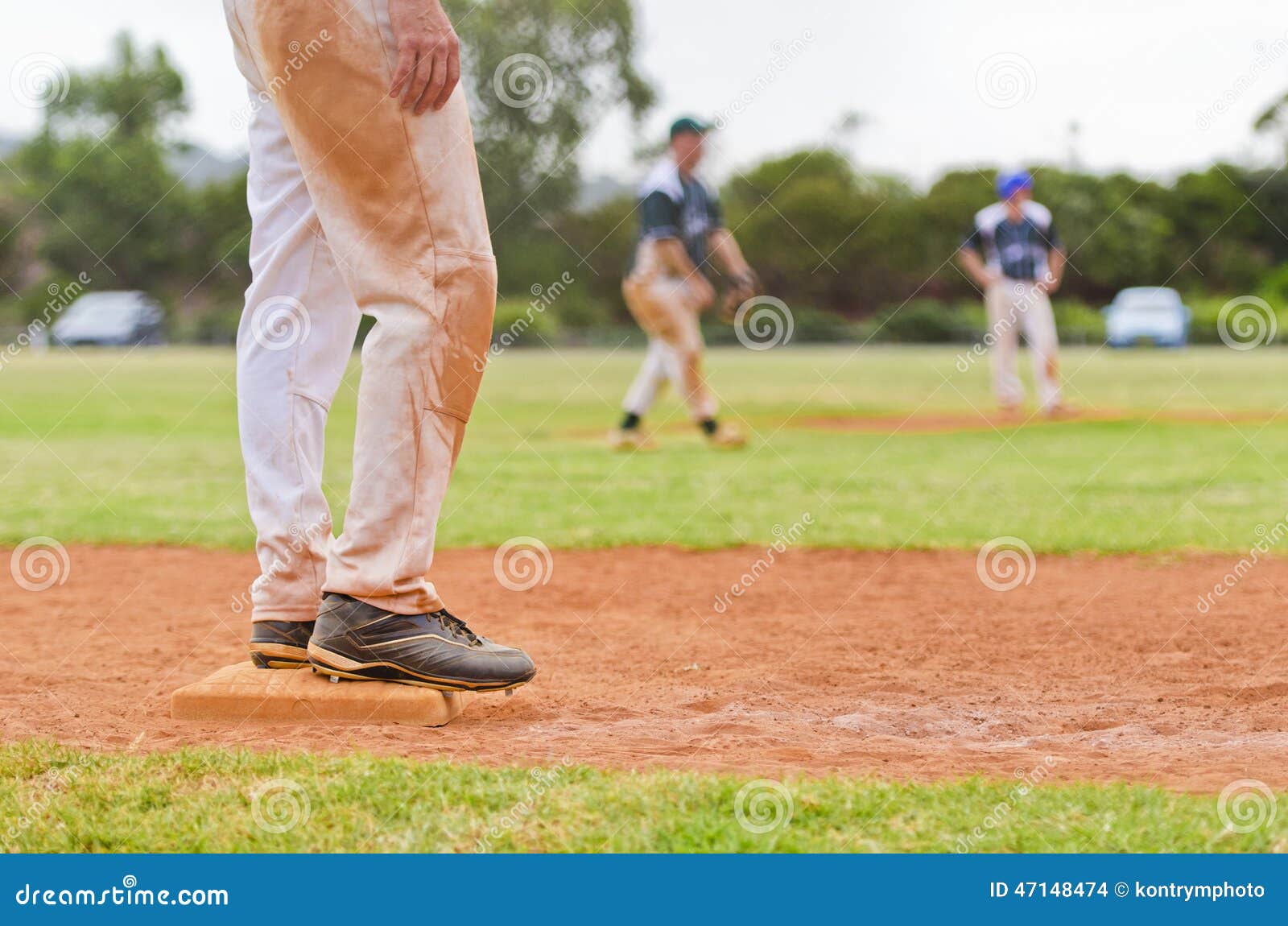 Baseball player on a base stock photo. Image of safety - 47148474