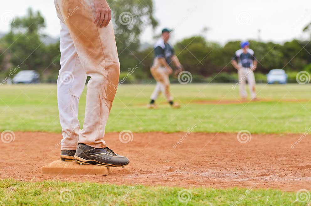 Baseball player on a base stock photo. Image of safety - 47148474